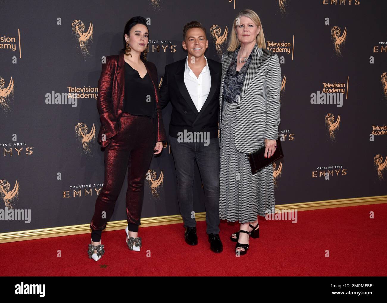 Jennifer Salim, from left, Paolo Nieddu, and Mary Lane arrive at night ...