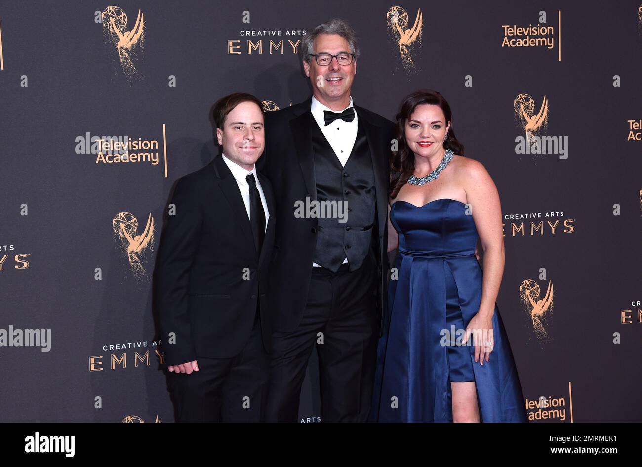 Andrew Leitch, from left, Jim Gloster and Kim Wannop arrive at night ...