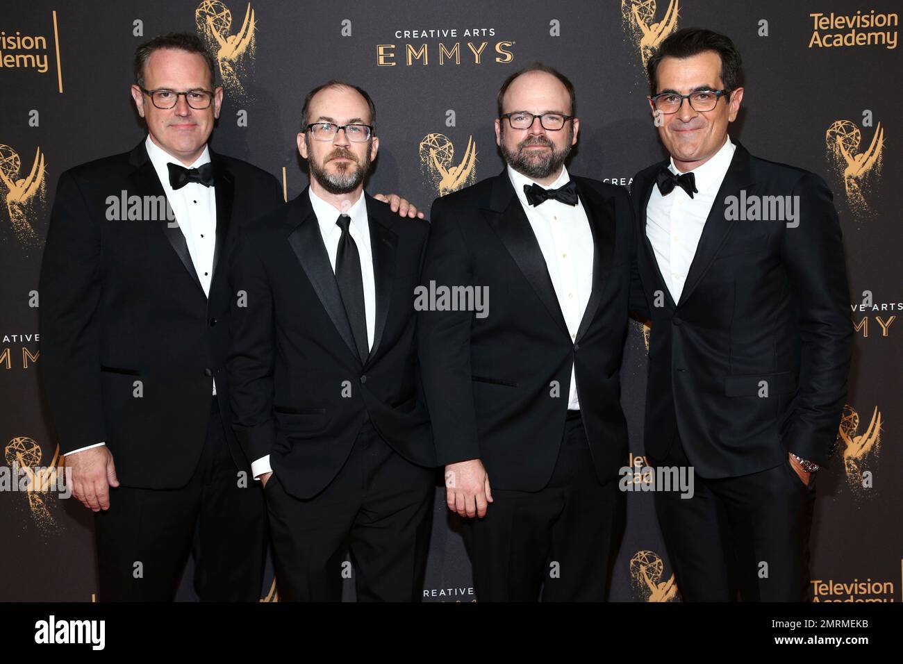Johnny Meeks, from left, Mel Cowan, Joel Spence, and Ty Burrell arrive ...