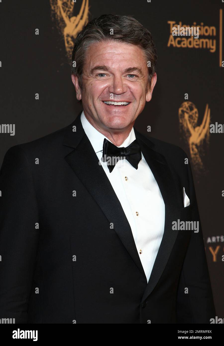 John Michael Higgins arrives at night two of the Television Academy's ...