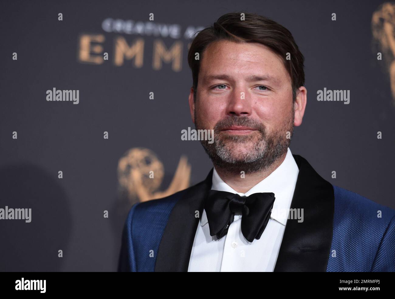 Benjamin Caron arrives at night two of the Creative Arts Emmy Awards at ...