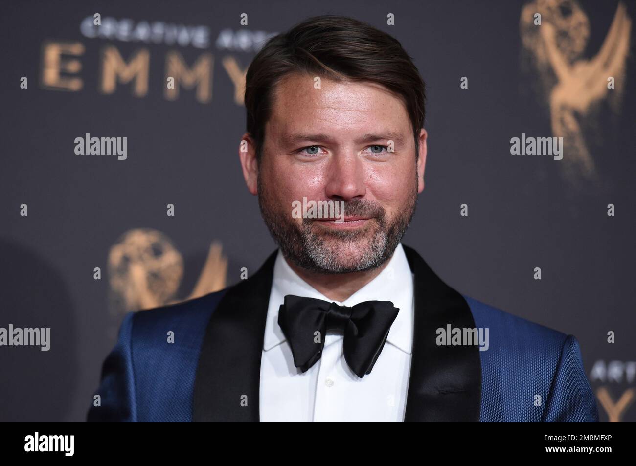 Benjamin Caron arrives at night two of the Creative Arts Emmy Awards at ...