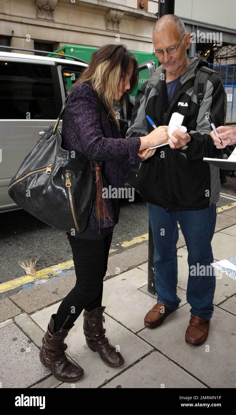EXCLUSIVE!! Rocker KT Tunstall signs autographs for fans as she arrives ...