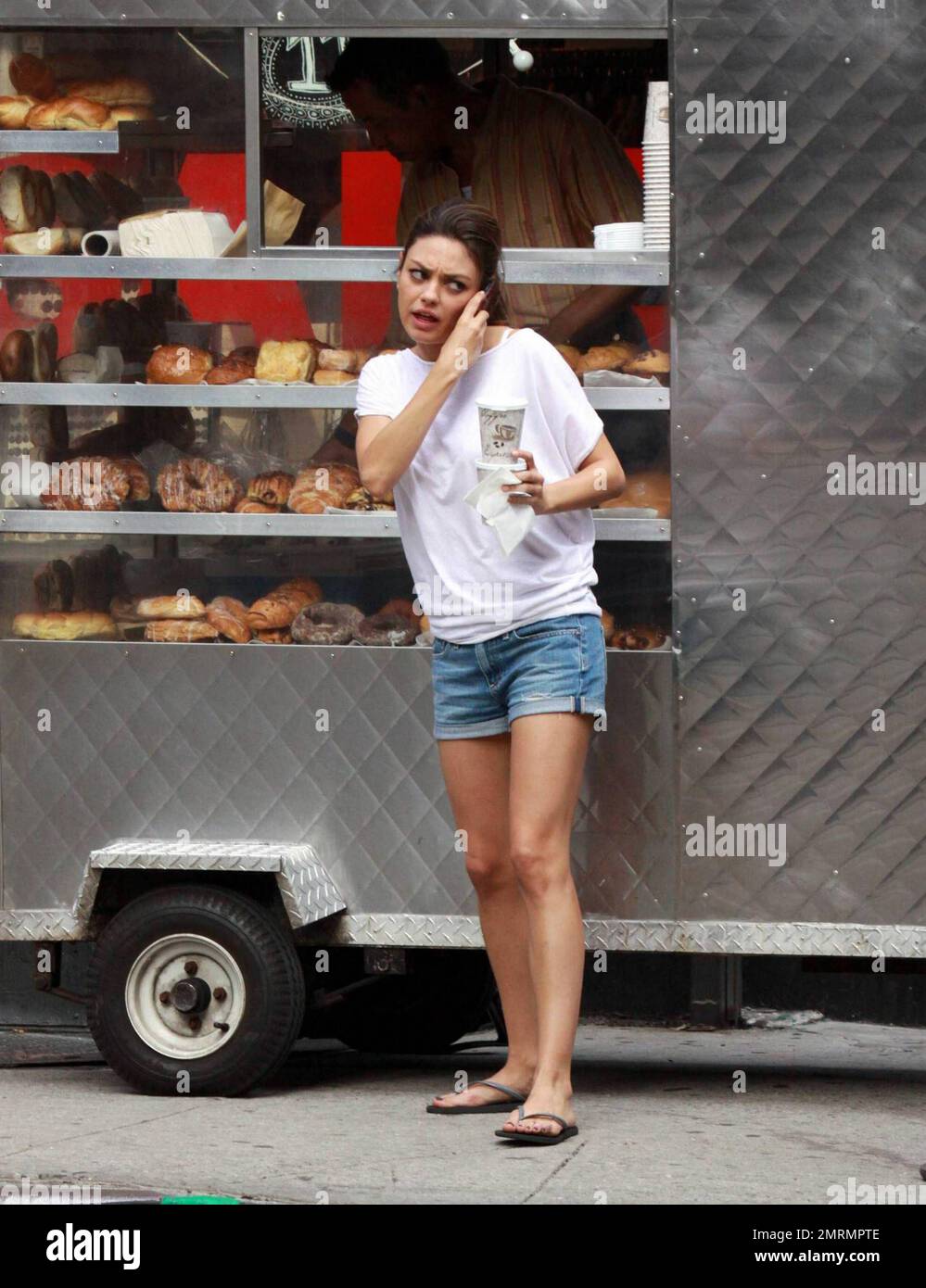 Mila Kunis films scenes on the set of her movie Friends With Benefits ...