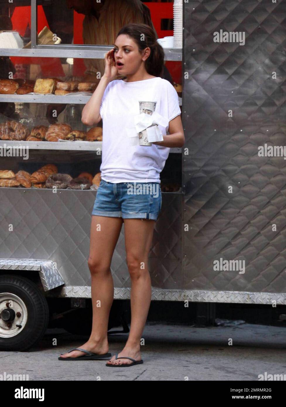 Mila Kunis films scenes on the set of her movie Friends With Benefits ...