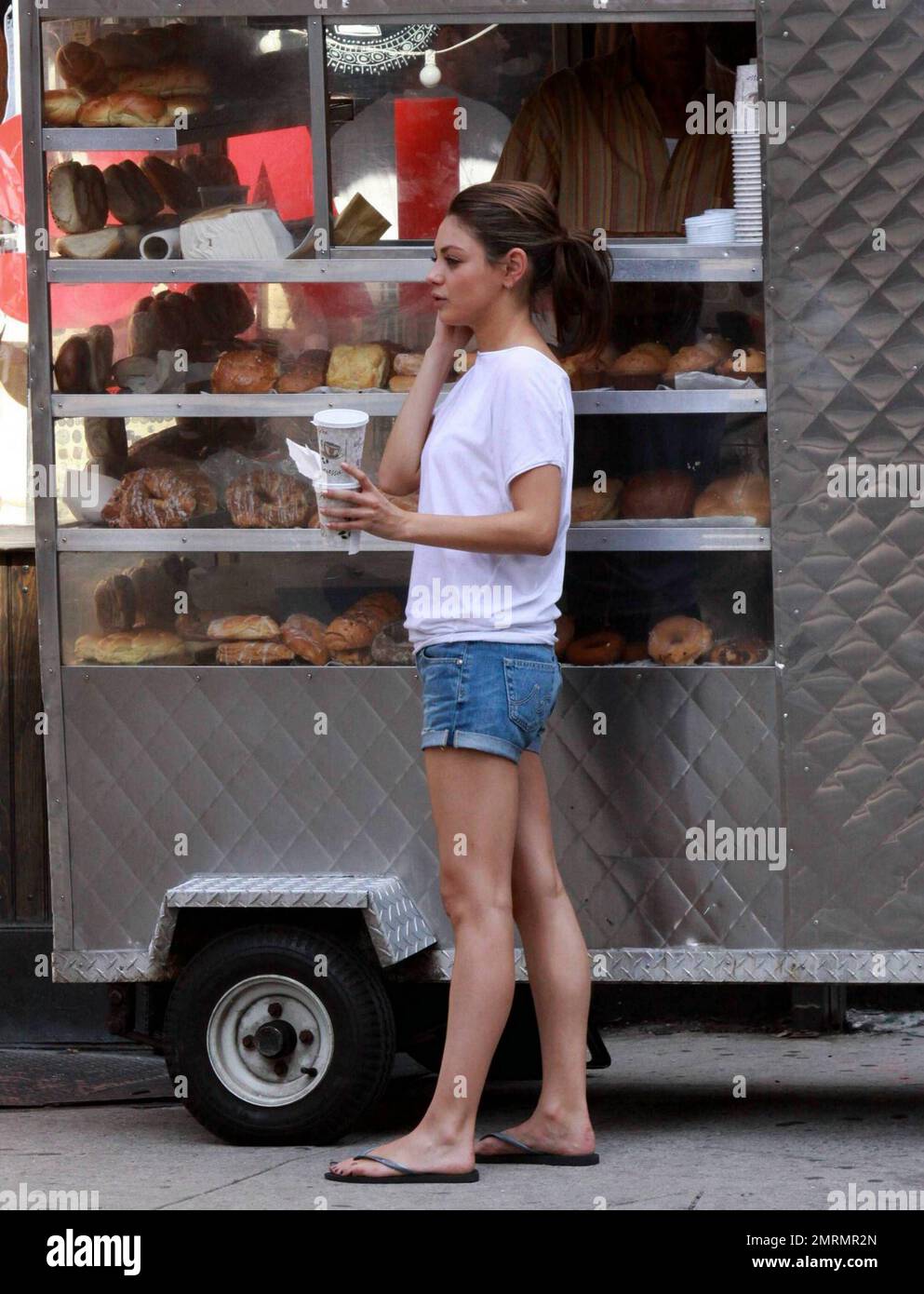 Mila Kunis films scenes on the set of her movie Friends With Benefits ...