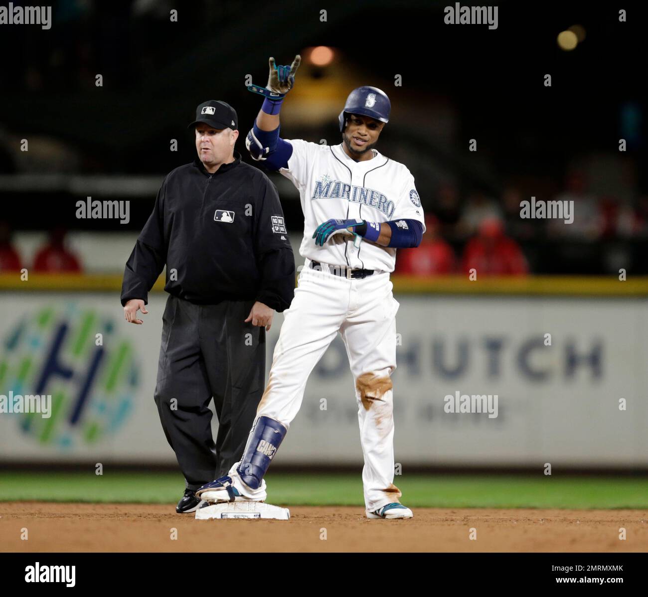 Seattle Mariners' Robinson Cano gestures to the stands after hitting ...