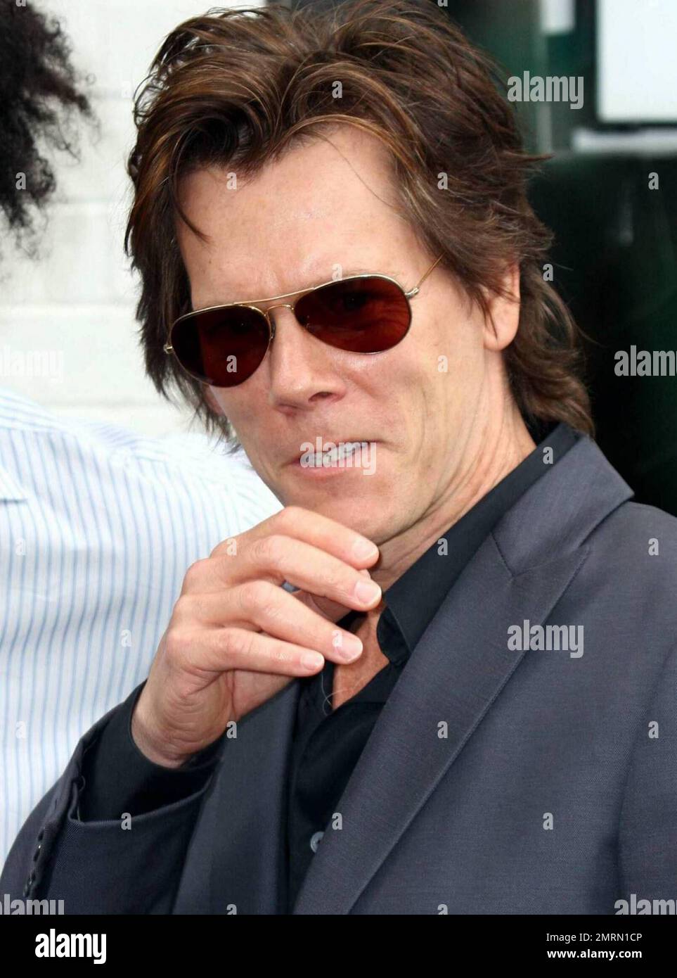 Kevin Bacon arrives at his wife Kyra Sedgwick's star ceremony on the ...