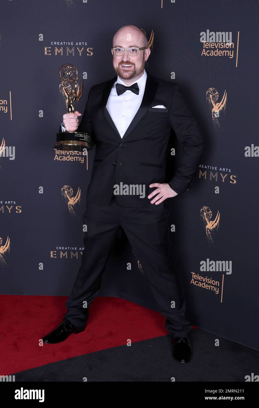 EXCLUSIVE - Justin Nichols poses for a portrait with the award for ...