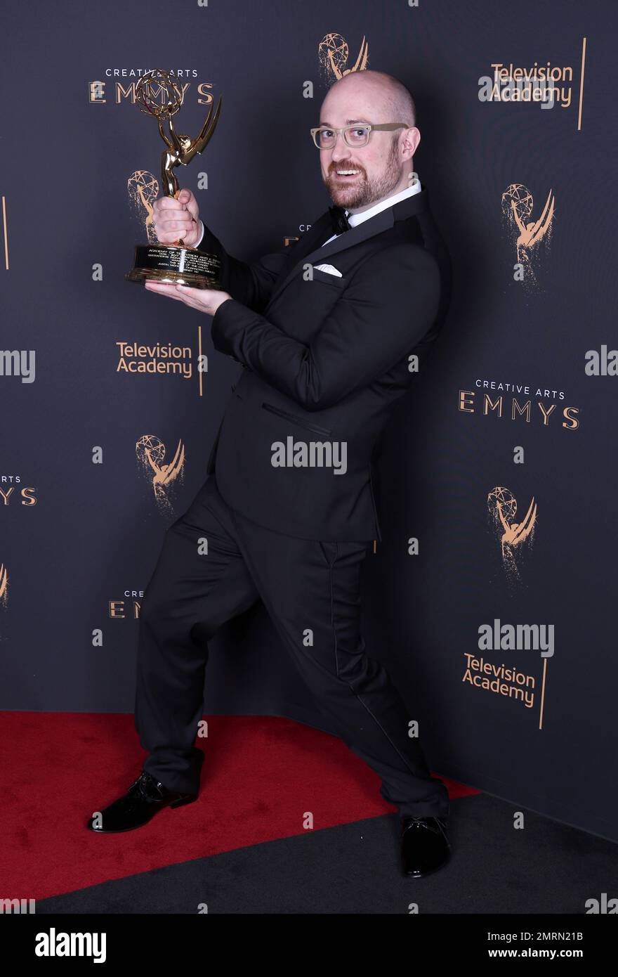 EXCLUSIVE - Justin Nichols poses for a portrait with the award for ...