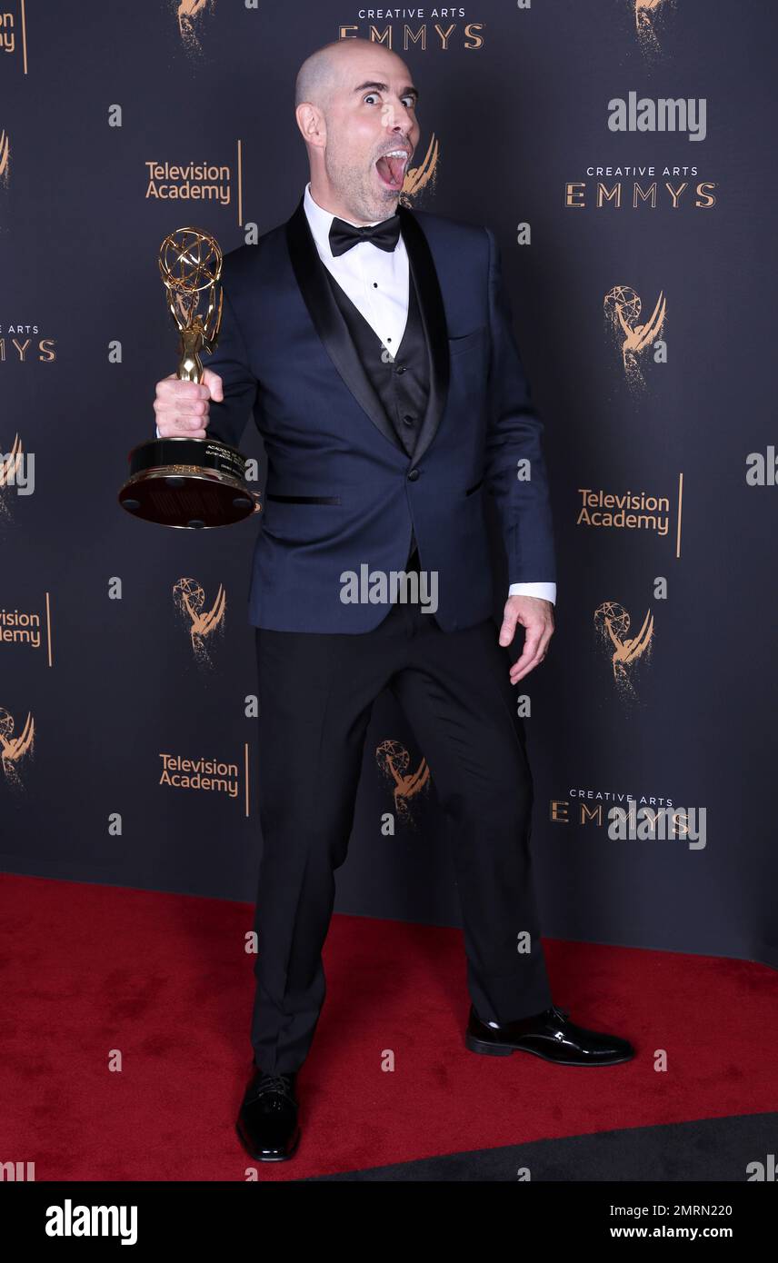 EXCLUSIVE - Craig Kellman poses for a portrait with the award for ...