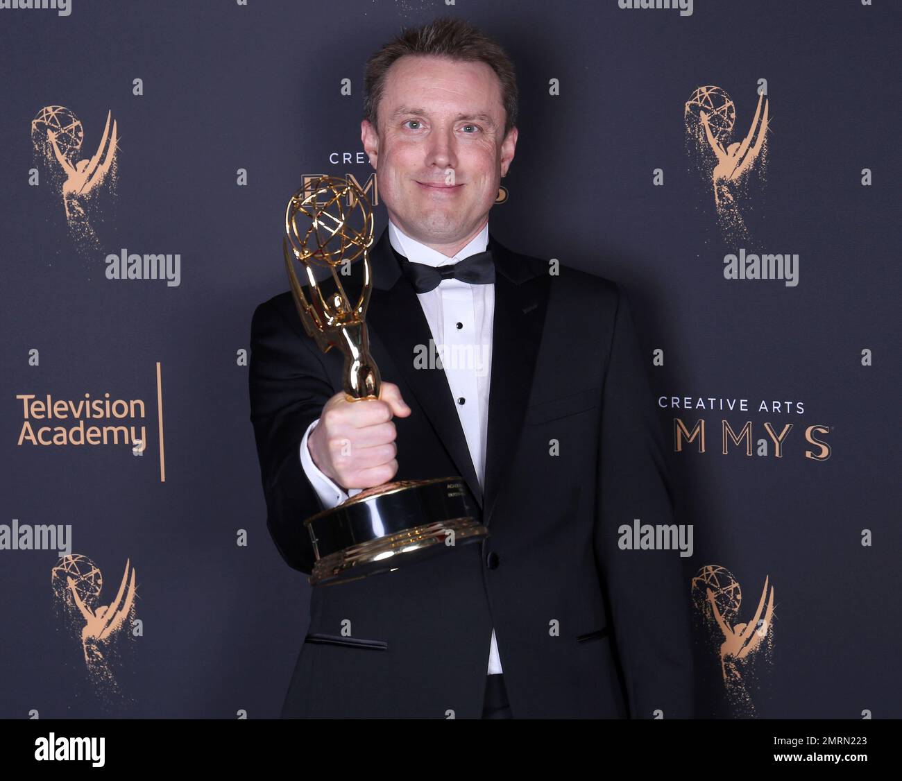 EXCLUSIVE - Scott Willis poses for a portrait with the award for ...