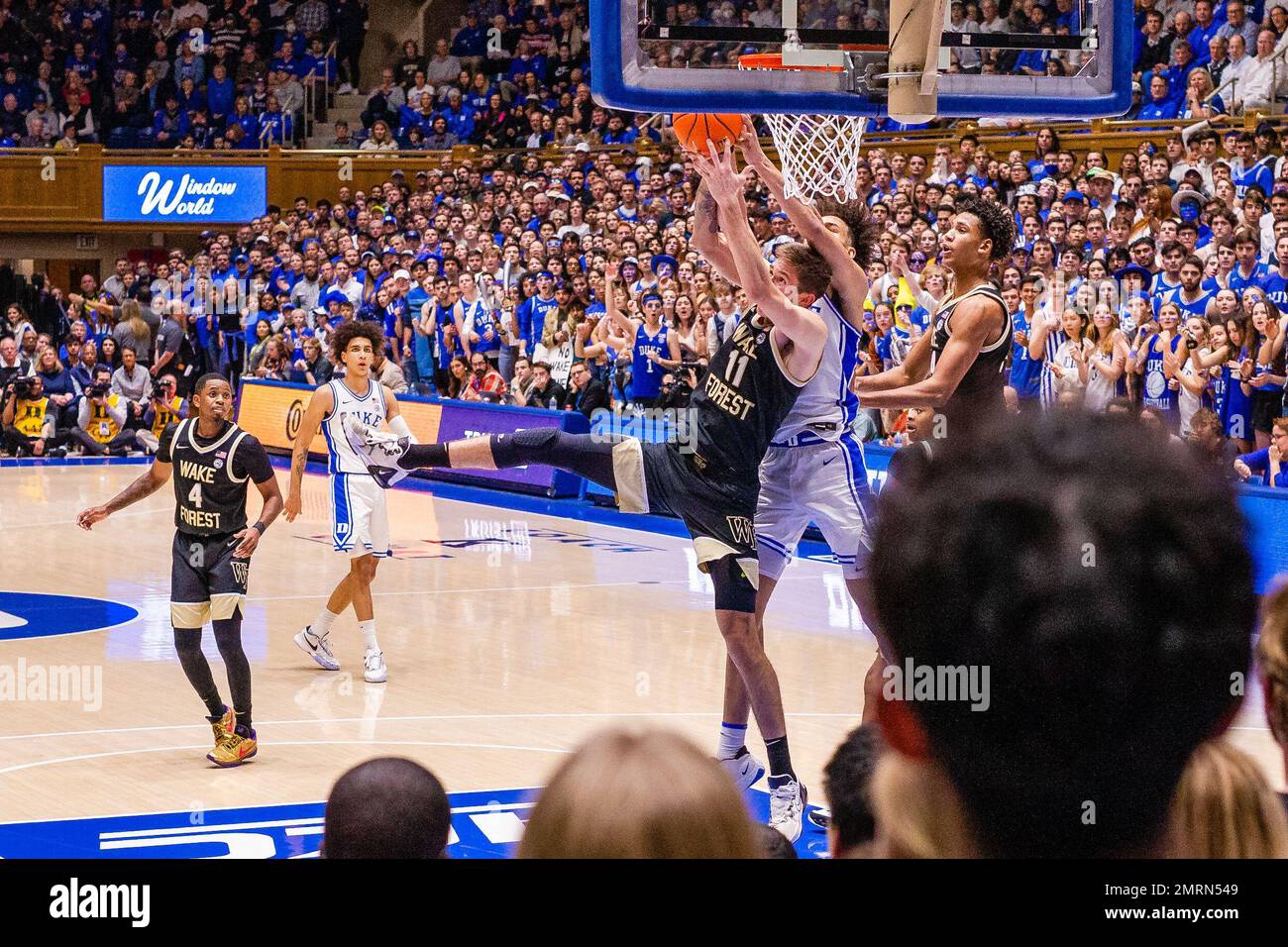 Durham, NC, USA. 31st Jan, 2023. Wake Forest Demon Deacons forward Andrew Carr (11) draws a foul ...