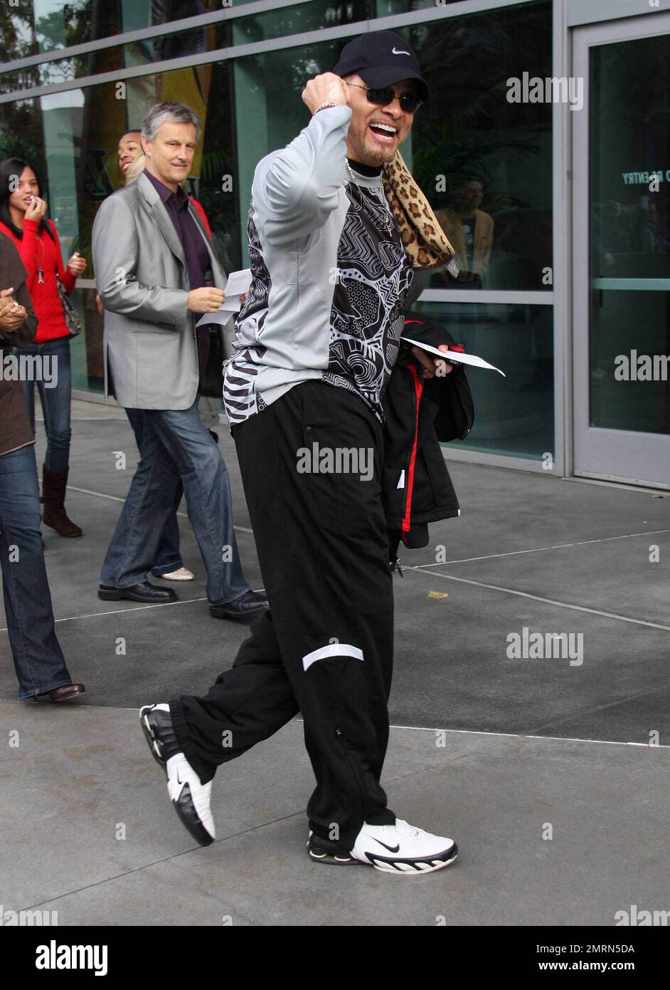 Sinbad (David Adkins) appears in high spirits as he arrives at Staples ...