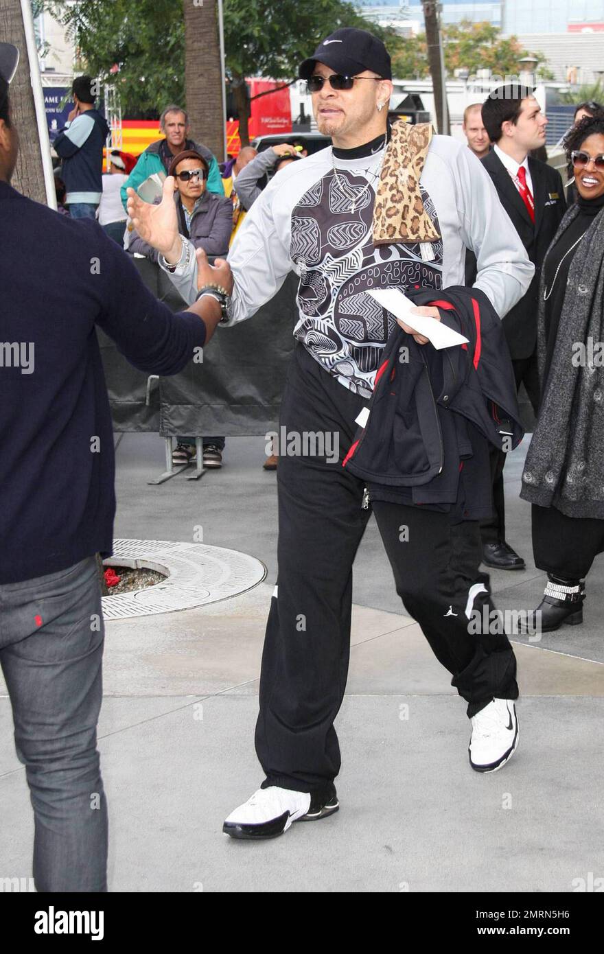 Sinbad (David Adkins) appears in high spirits as he arrives at Staples ...