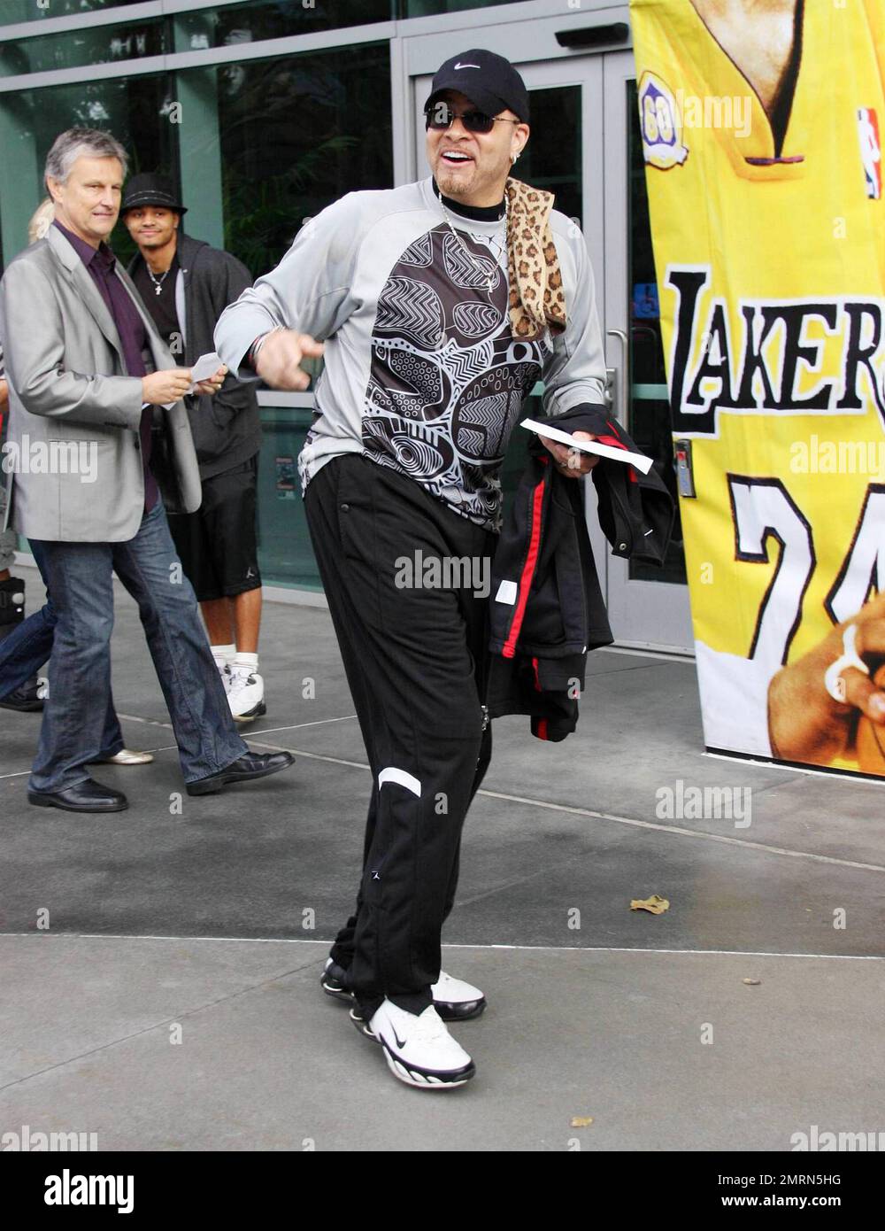 Sinbad (David Adkins) appears in high spirits as he arrives at Staples ...