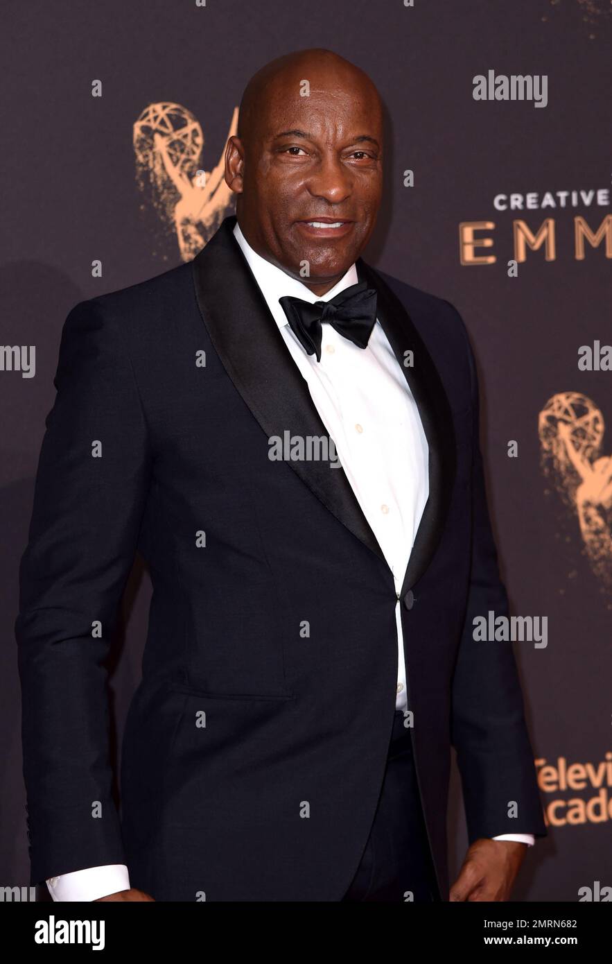 John Singleton arrives at night one of the Creative Arts Emmy Awards at ...