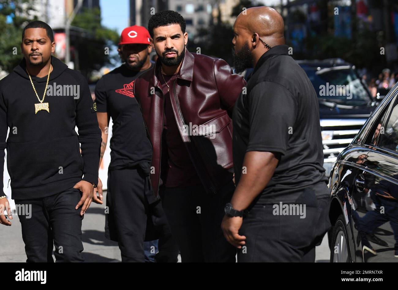 Drake, center, arrives at the premiere for "The Carter Effect" on day 3 ...