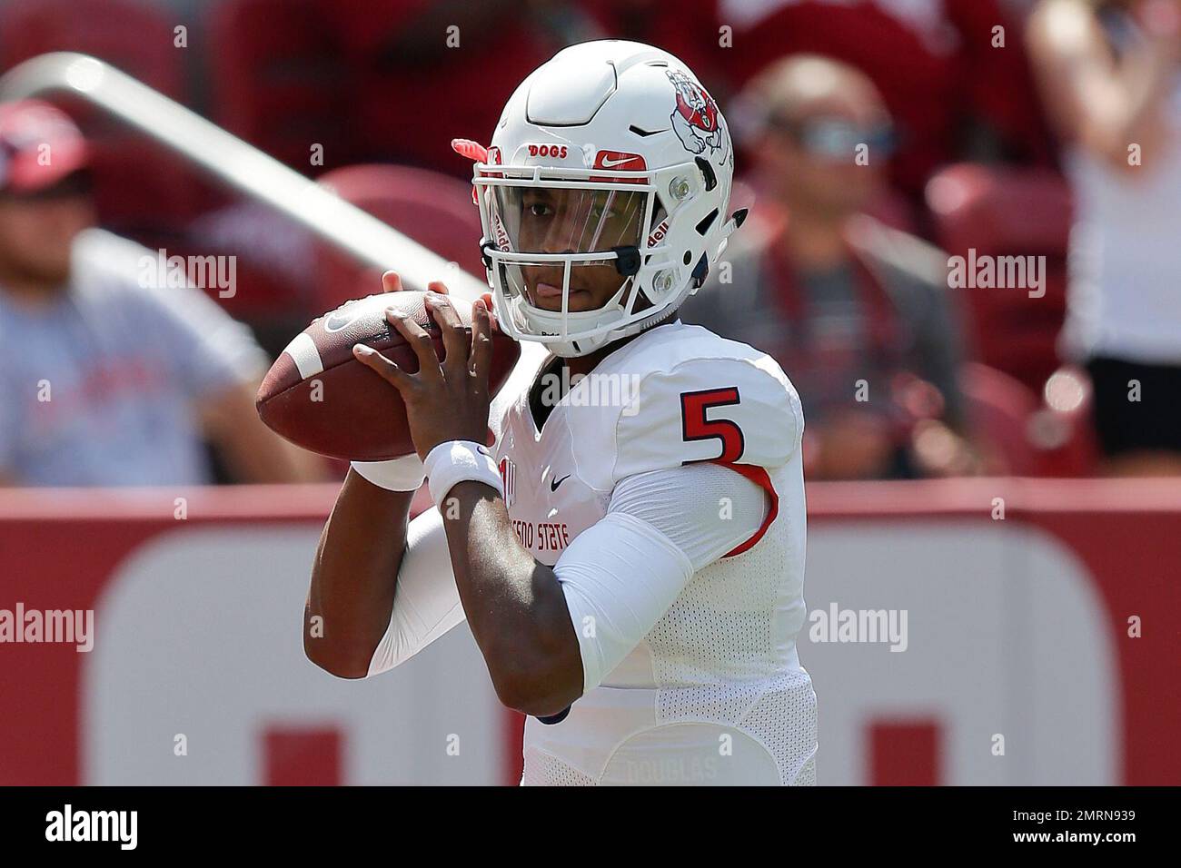 Fresno State quarterback Chason Virgil throws the ball before an NCAA ...
