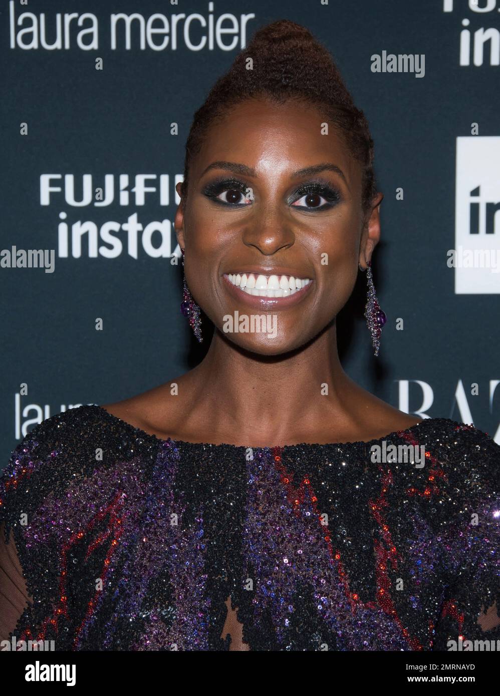 Issa Rae attends the Harper's BAZAAR 'Icons by Carine Roitfeld' party ...