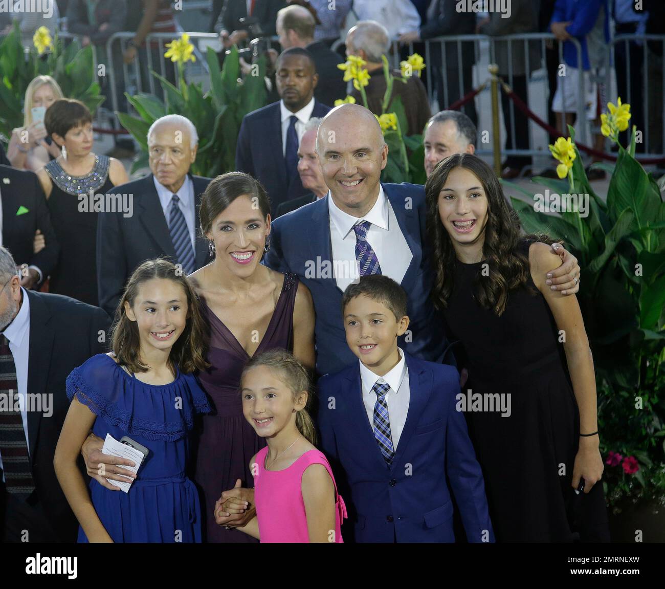 Rebecca Lobo poses with her family along the red carpet as she arrives ...