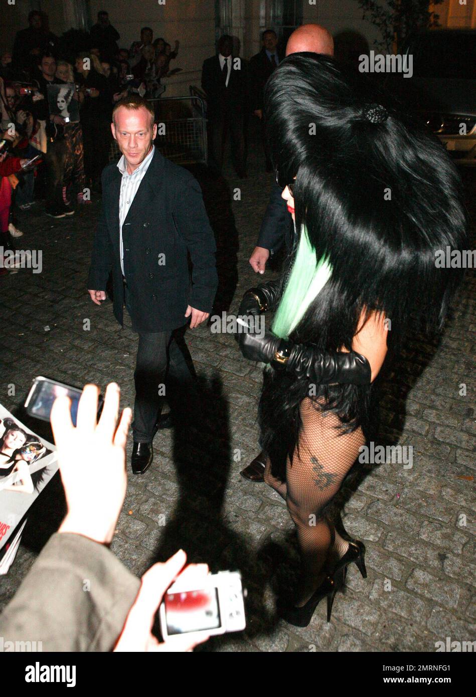 Lady Gaga greets her adoring fans and poses for photographers as she ...
