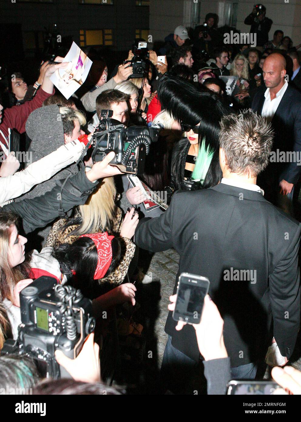 Lady Gaga greets her adoring fans and poses for photographers as she ...