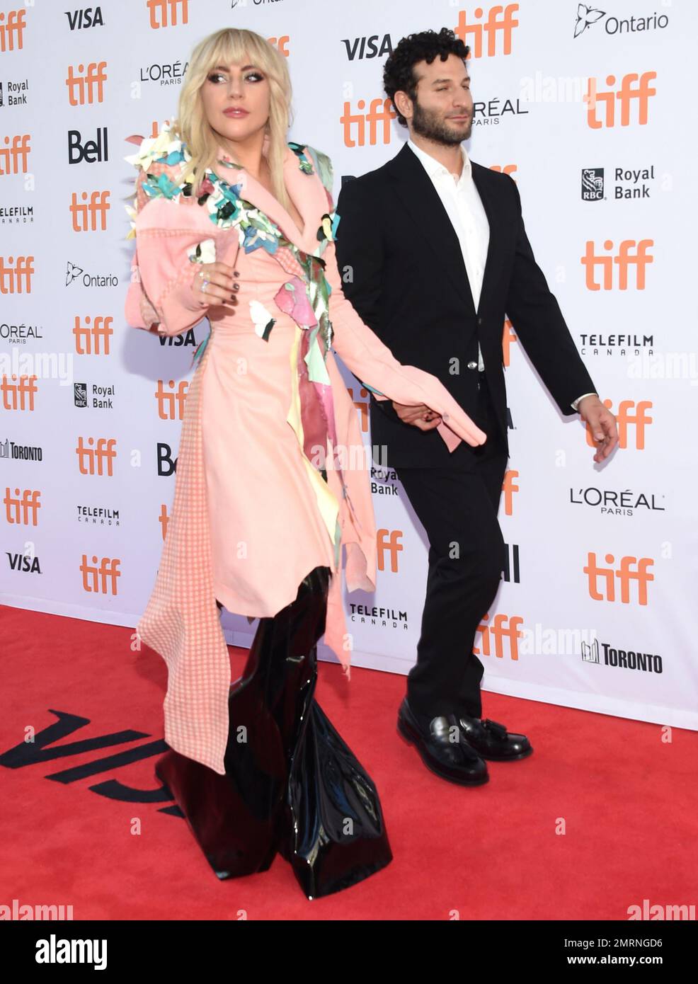 Lady Gaga, left, and director Chris Moukarbel attend a premiere for ...