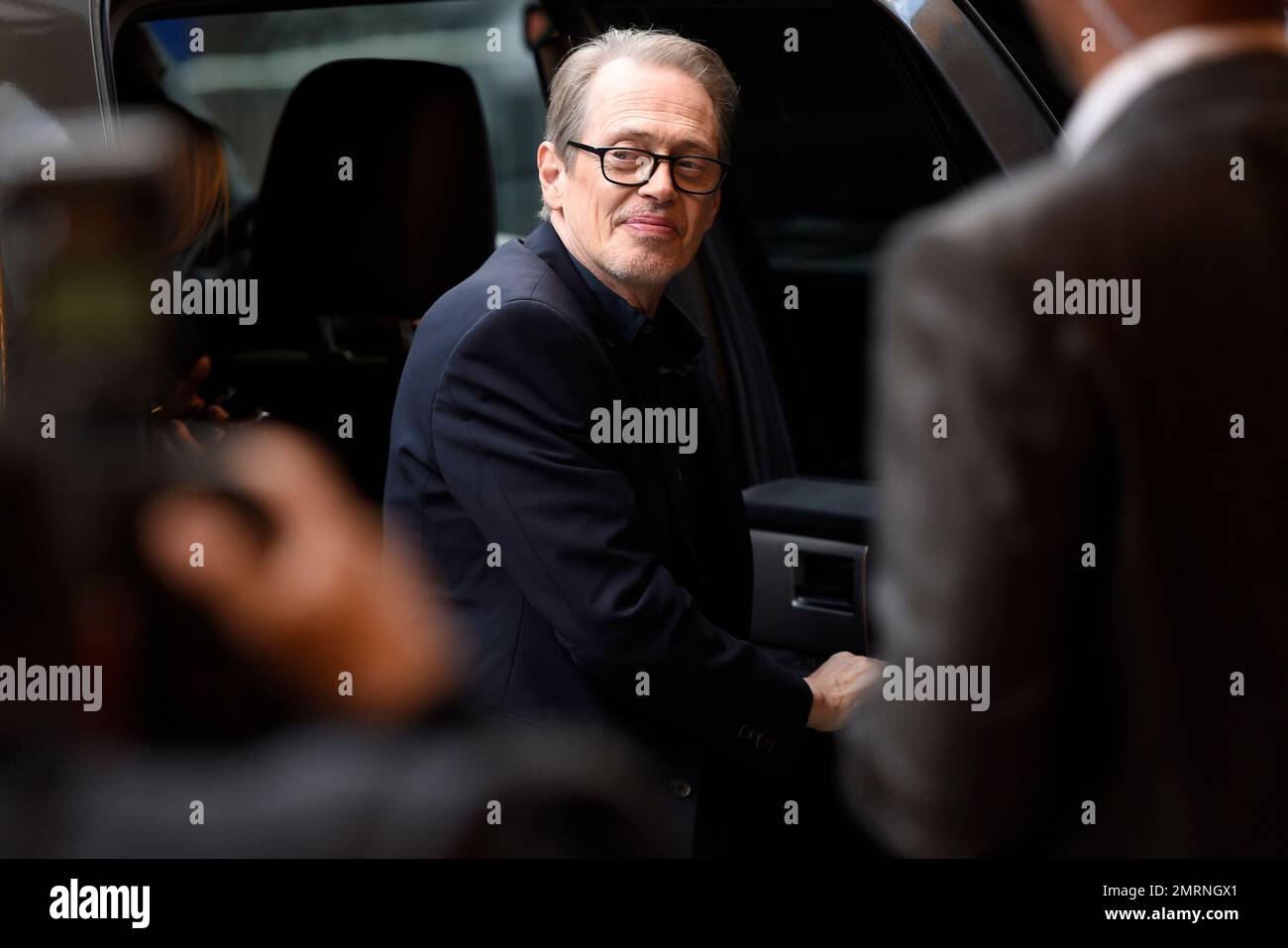 Steve Buscemi exits a car as he arrives at a premiere for "The Death of ...