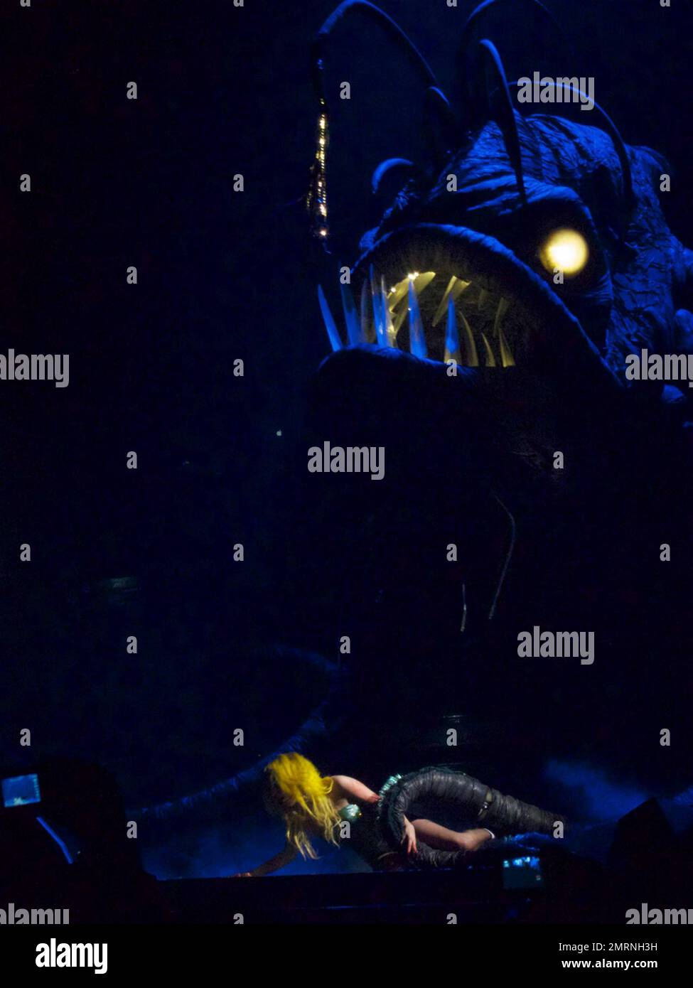 Performing with her backup dancers Lady Gaga belts out her tunes and ...