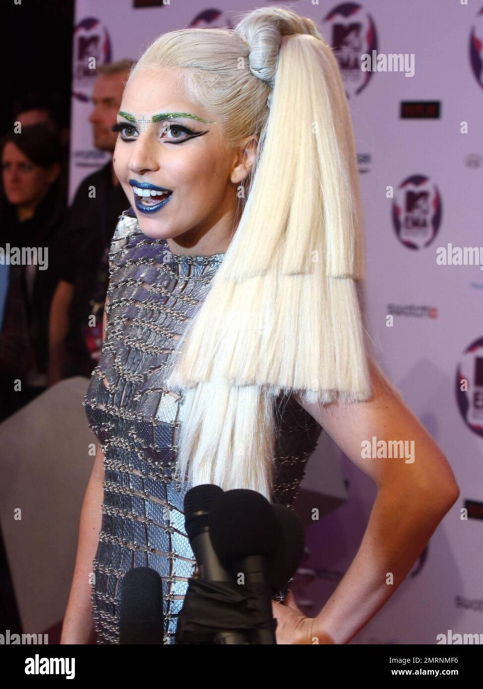 In a typical edgy outfit completed with glittering green eybrows, a ...