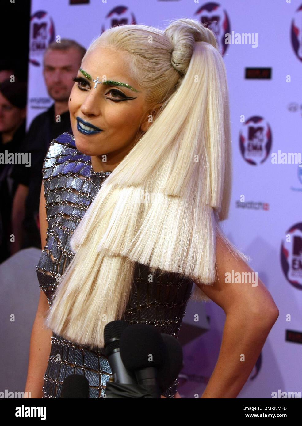 In a typical edgy outfit completed with glittering green eybrows, a ...