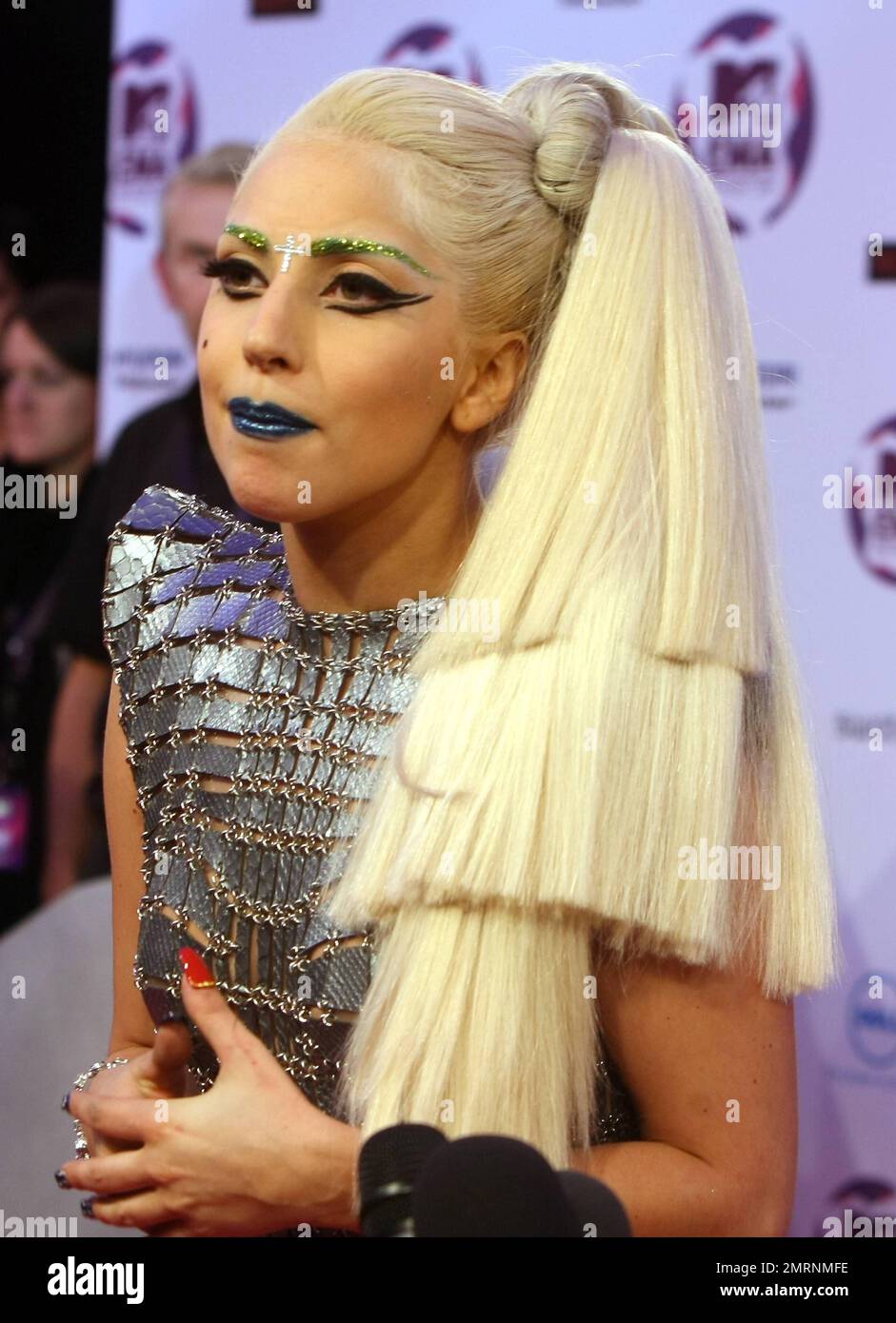 In a typical edgy outfit completed with glittering green eybrows, a ...