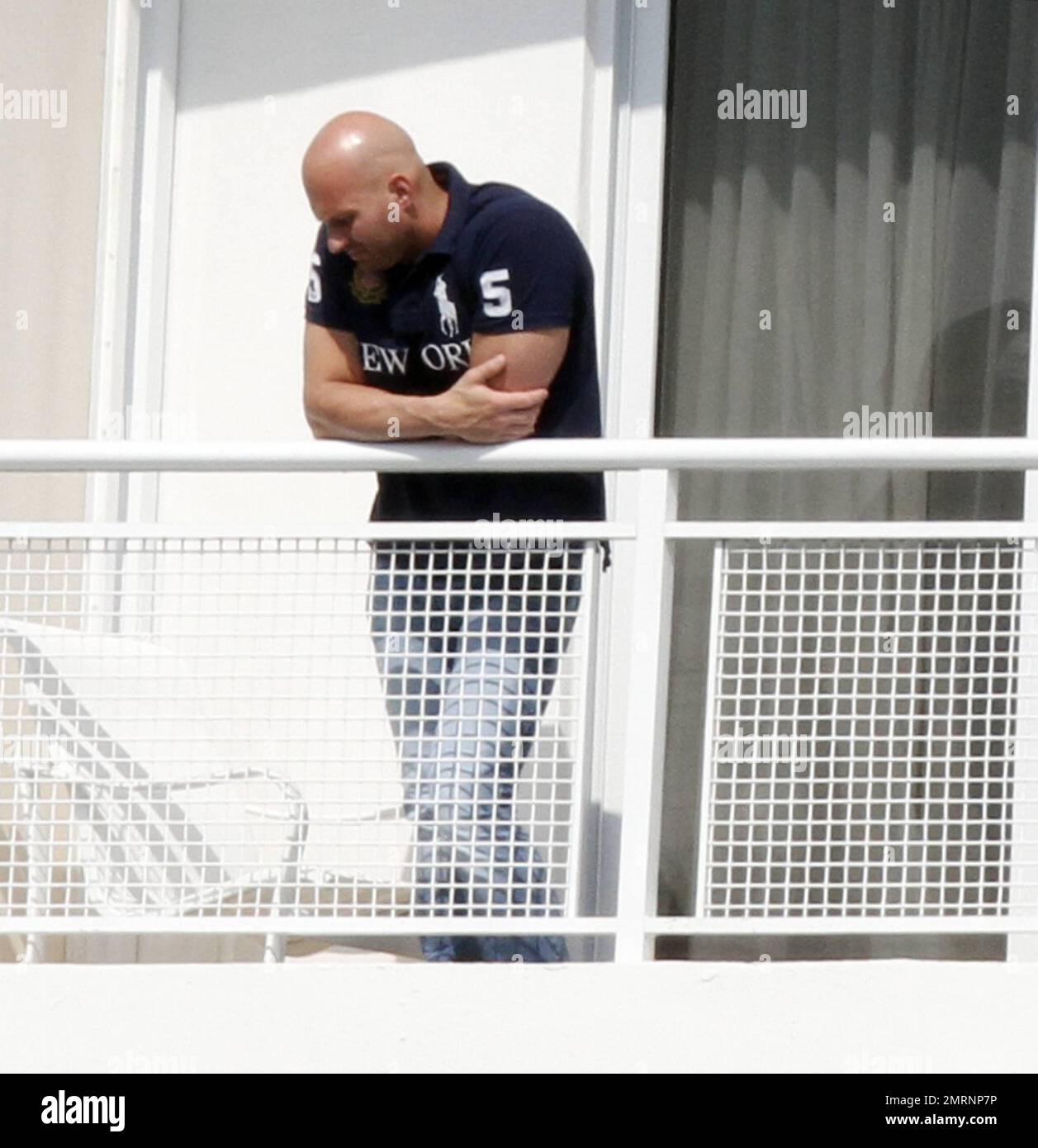 EXCLUSIVE!! Lady Gaga's bodyguards relax on their hotel balconies while ...