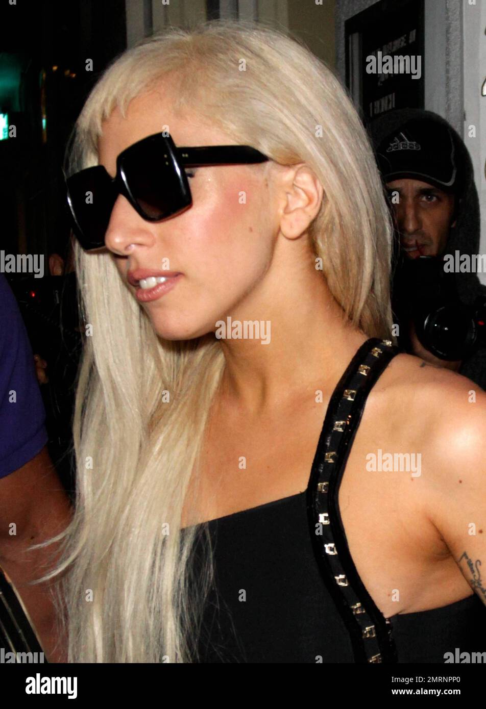 Lady Gaga greets fans, signing autographs and hugging some as she ...