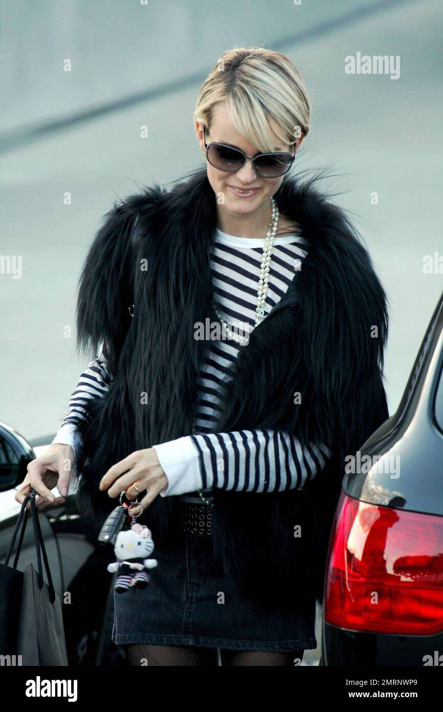 Johnny Hallyday's wife Laeticia Boudou leaves Maxfield's after getting ...