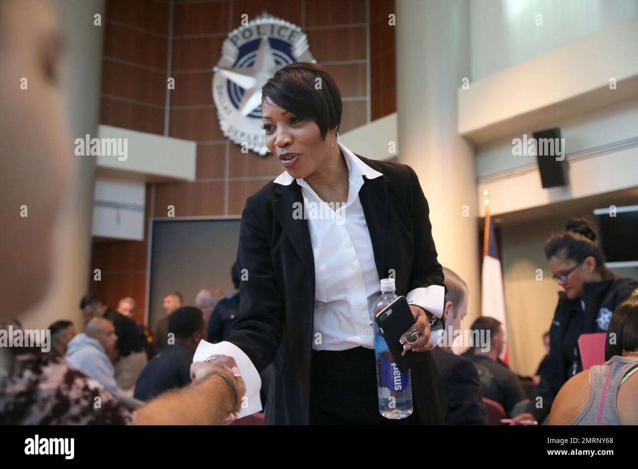 New Dallas Police Chief U. Reneé Hall shakes hands with potential ...