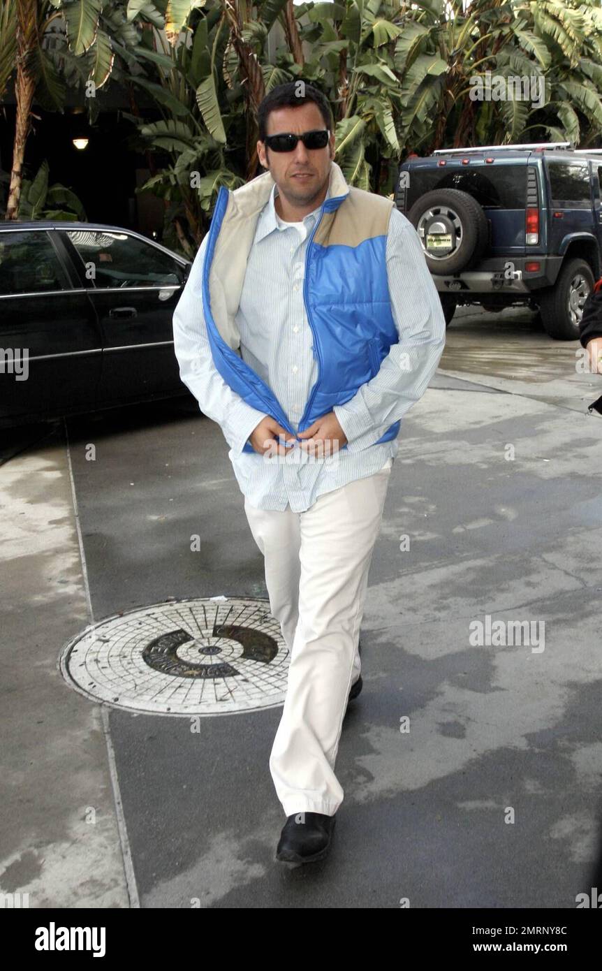 Adam Sandler arrives at the Staples Center for the Los Angeles Lakers ...