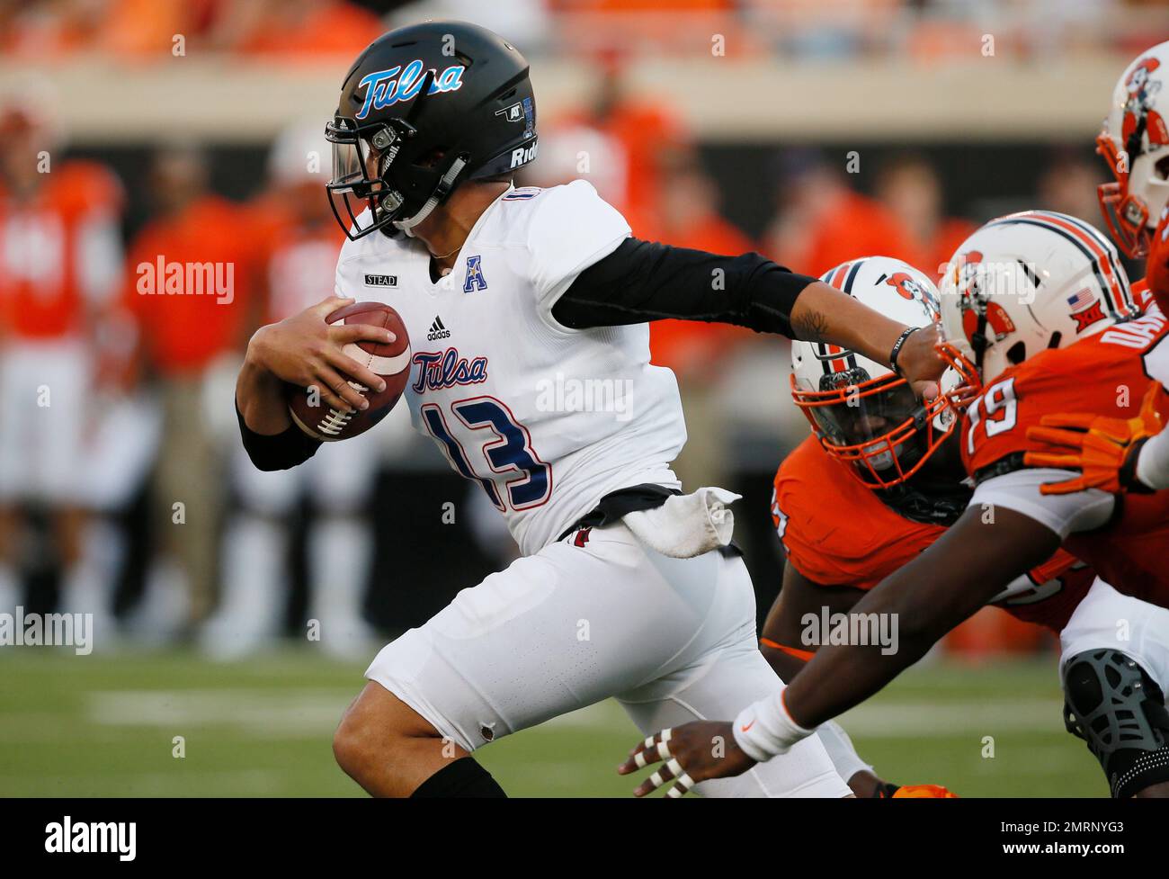 Tulsa quarterback Luke Skipper (13) carries during an NCAA college ...