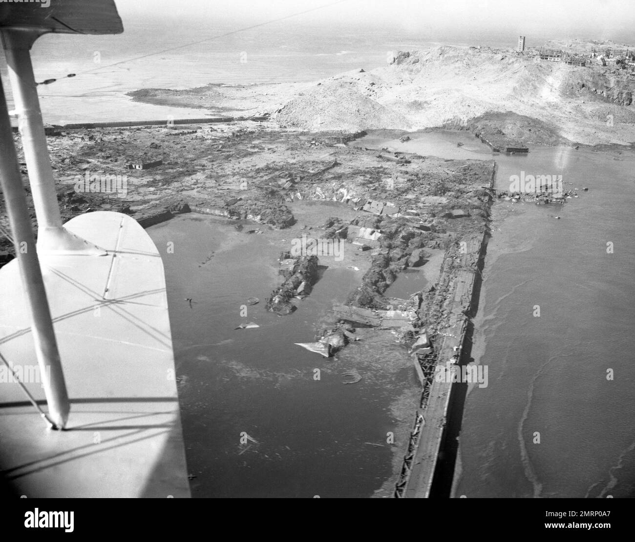An aerial picture taken over Heligoland showing wrecked submarine pens ...