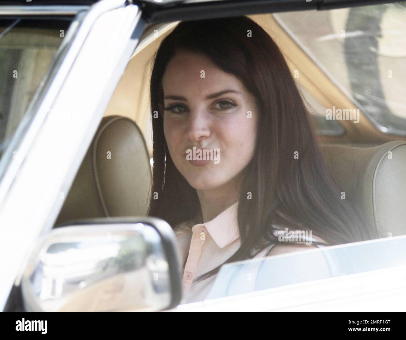 Singer Lana Del Rey greets fans outside the Chateau Marmont. The 26 ...