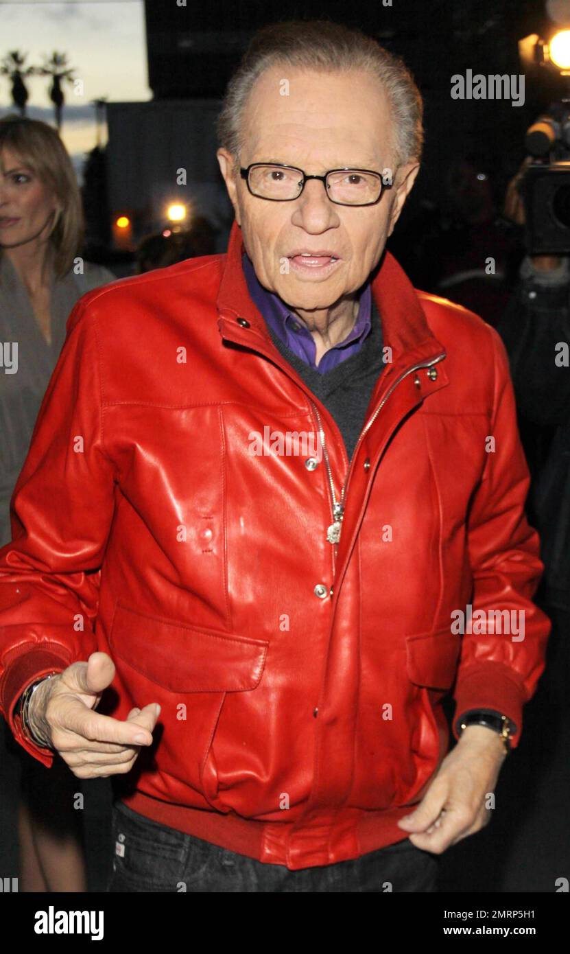 In a red leather jacket Larry King arrives at the CNN building prior to ...