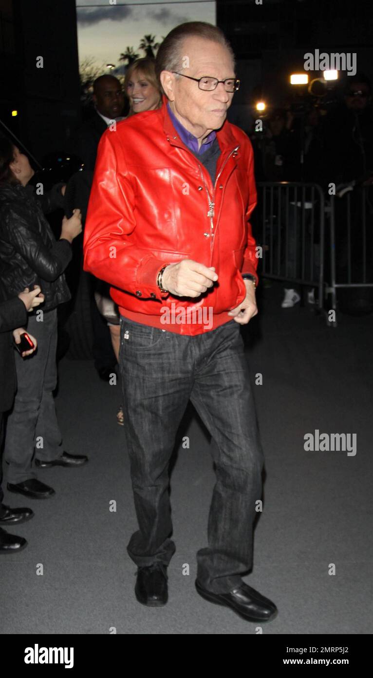 In a red leather jacket Larry King arrives at the CNN building prior to ...