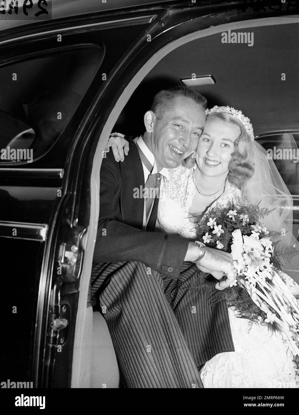 Eddie Waitkus, first baseman for the Philadelphia Phillies, and Carol ...