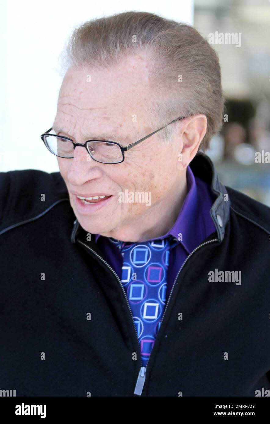 Former CNN talk show host Larry King wears his tie partially tied as he ...
