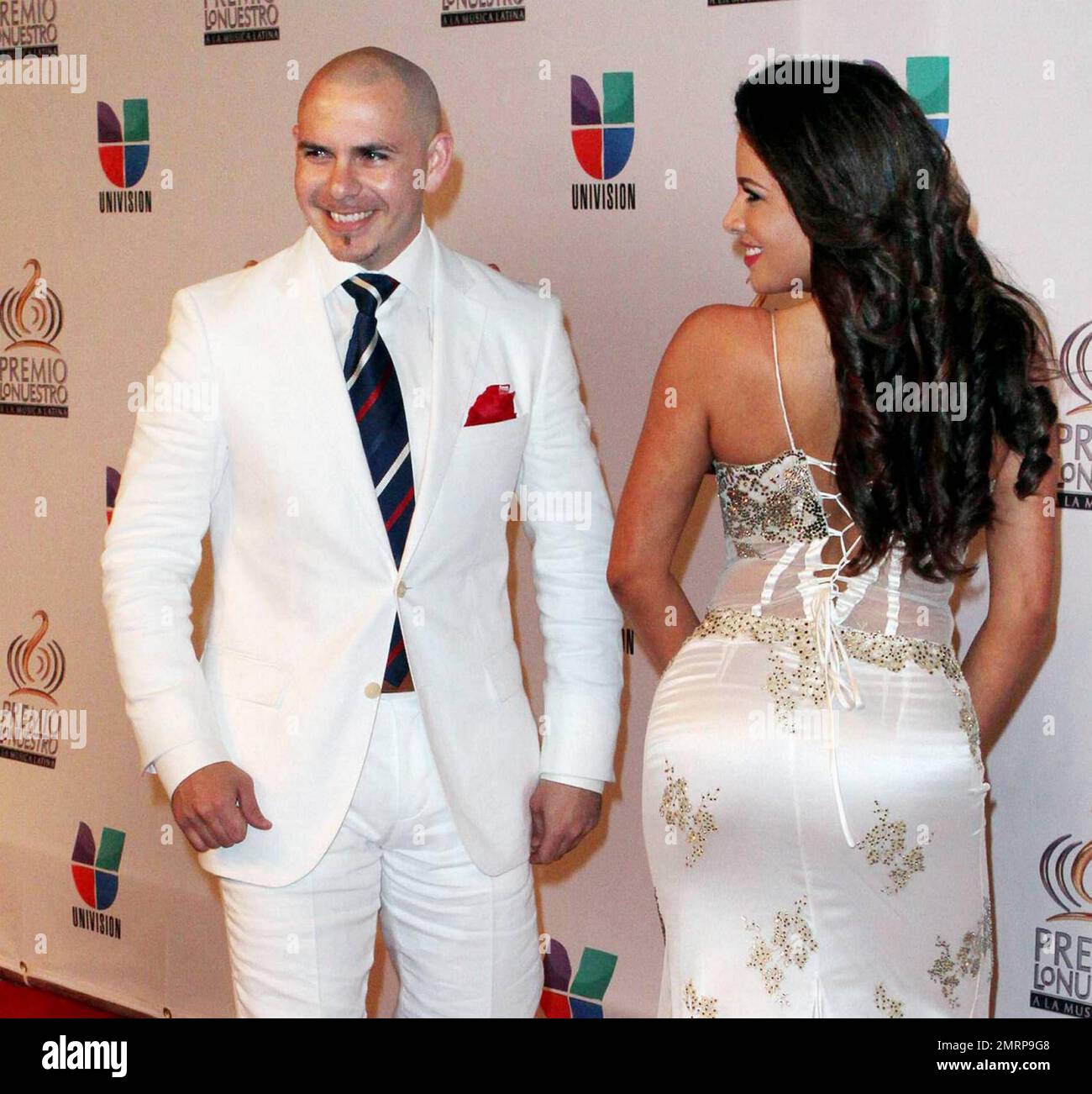 American rapper, singer, songwriter and producer Pitbull (aka Armando Perez) and guest walk the ...