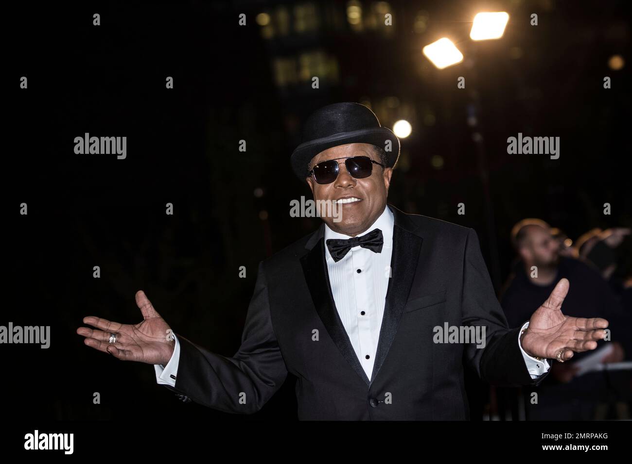 Tito Jackson poses for photographers upon arrival at the GQ's Men of ...
