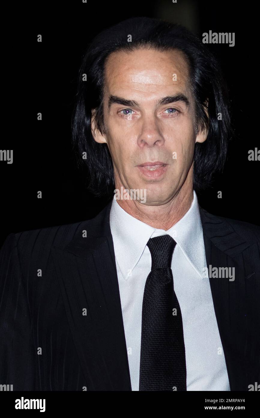 Nick Cave poses for photographers upon arrival at the GQ's Men of The ...