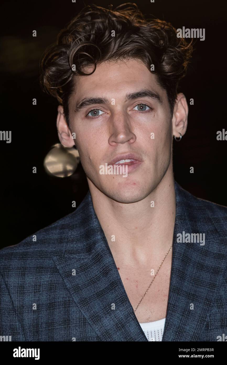 Isaac Carew poses for photographers upon arrival at the GQ's Men of The ...