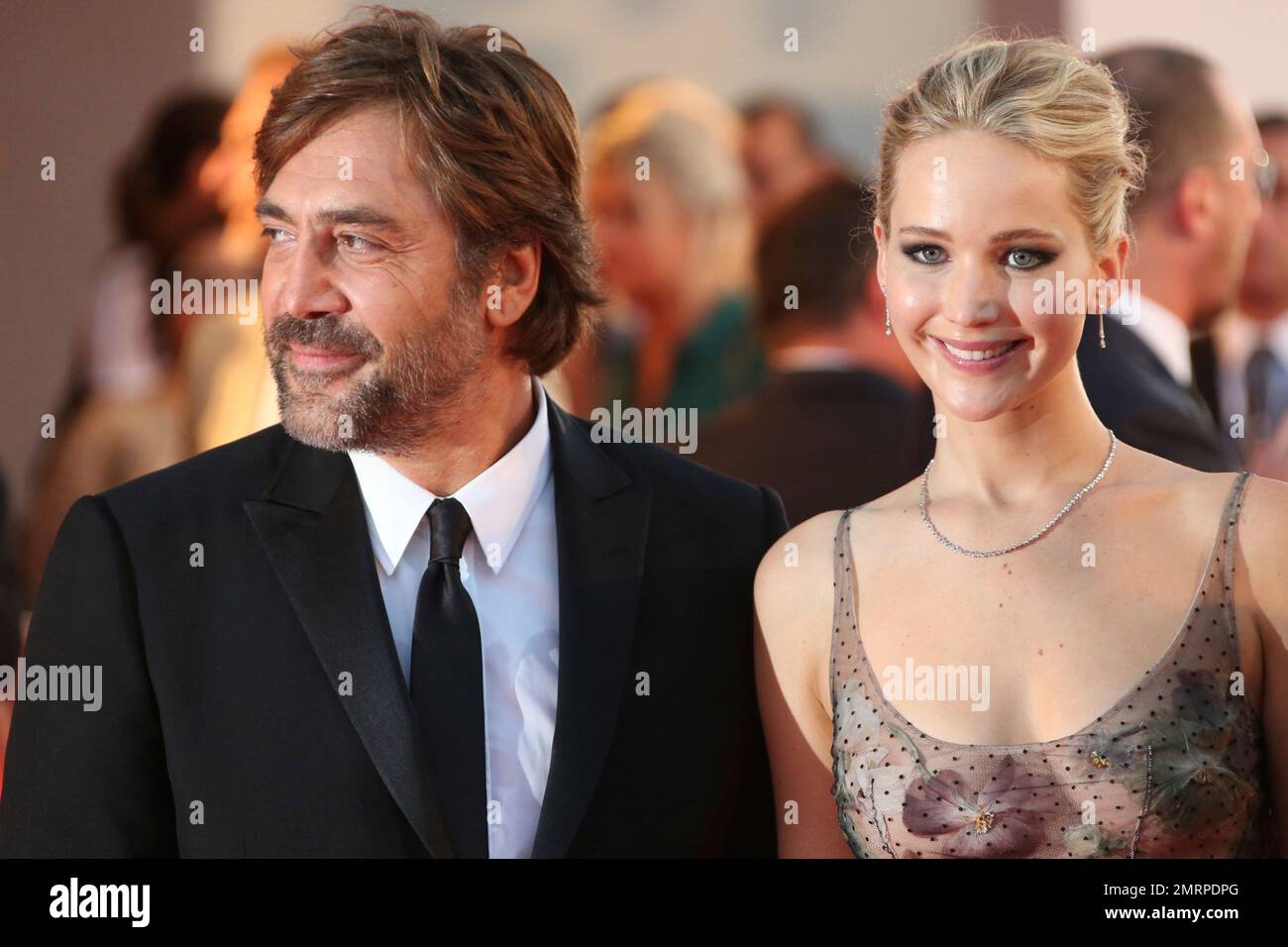 Actors Jennifer Lawrence, right, and Javier Bardem pose for ...